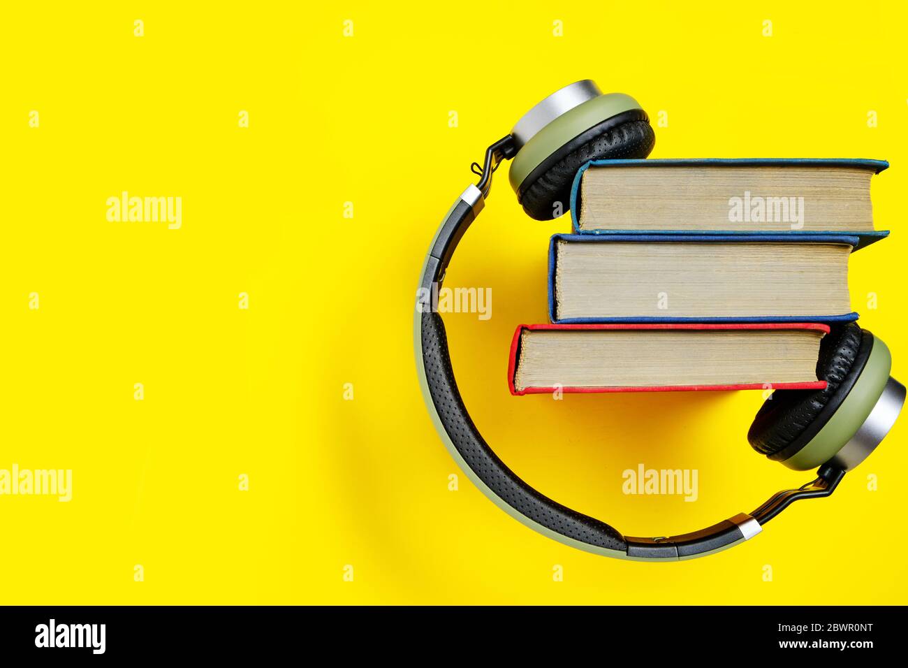 Stack of books with headphone hi-res stock photography and images - Alamy