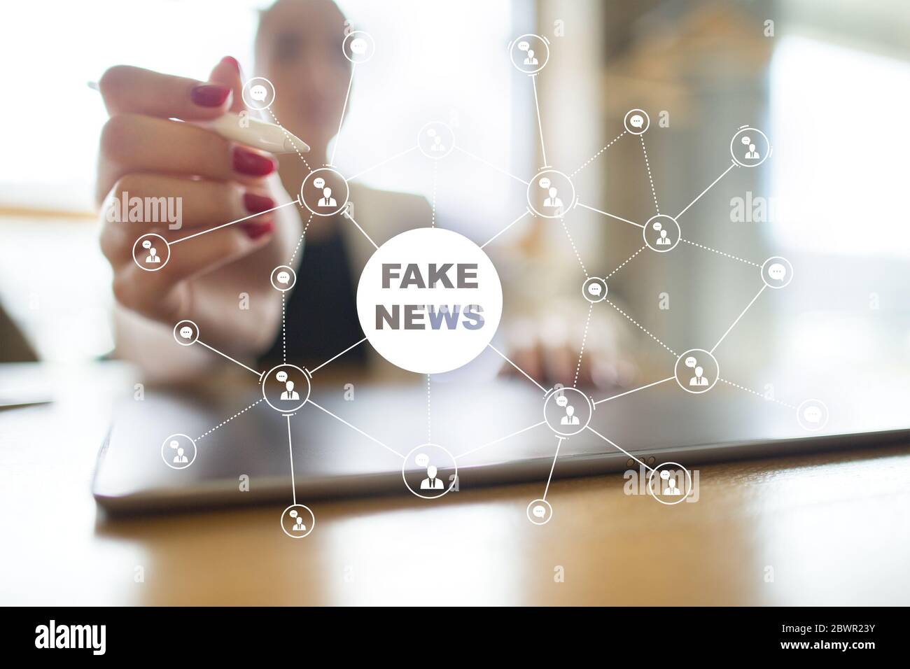Fake news warning on the virtual screen Stock Photo - Alamy
