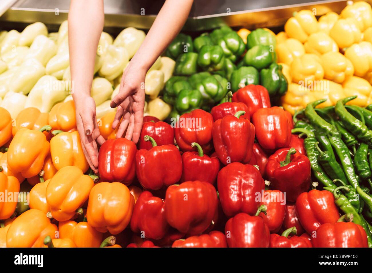 Close up stand with variety of fresh peppers in supermarket Stock Photo ...