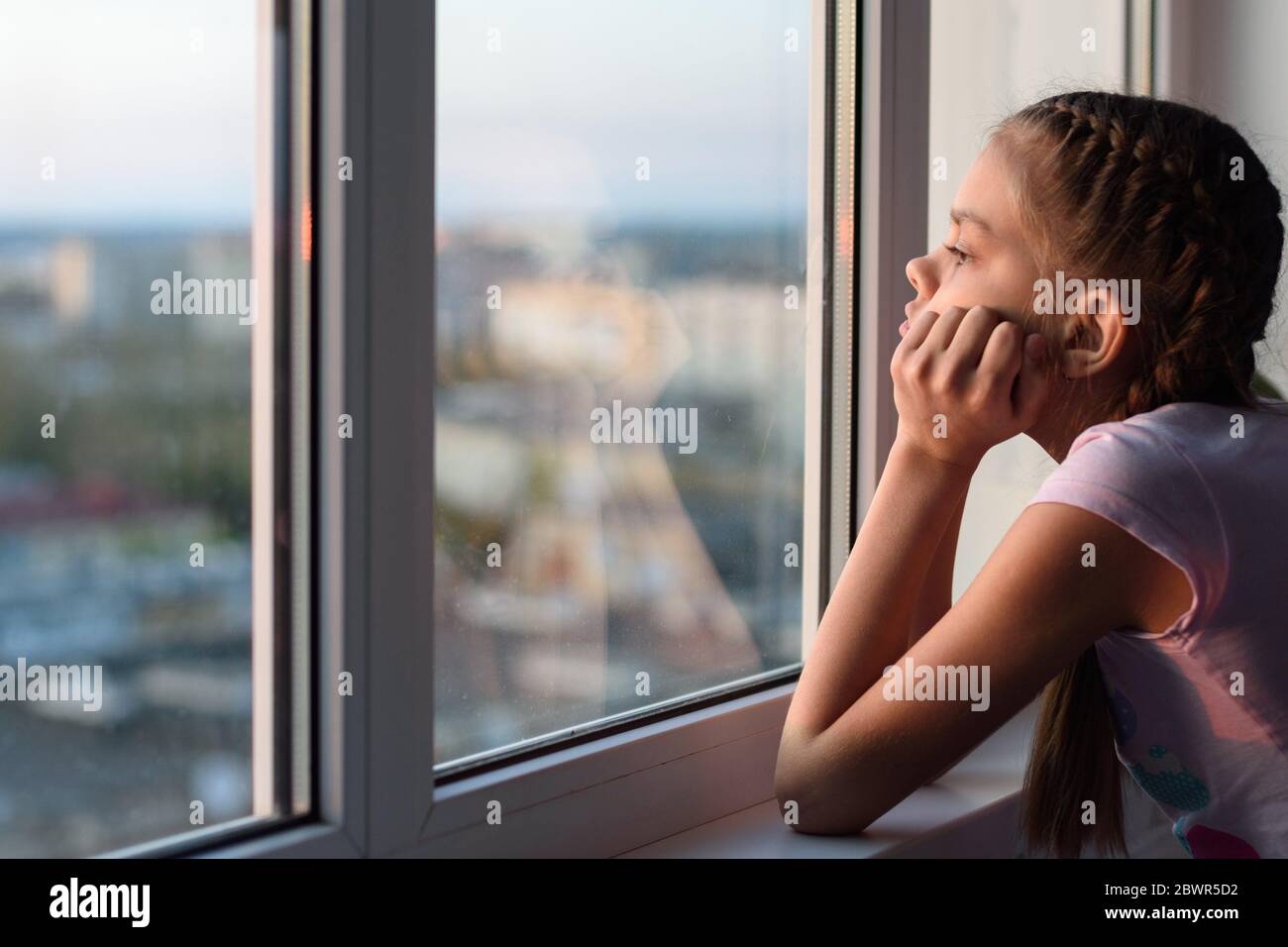 Self isolation looks out the window hope hi-res stock photography and ...