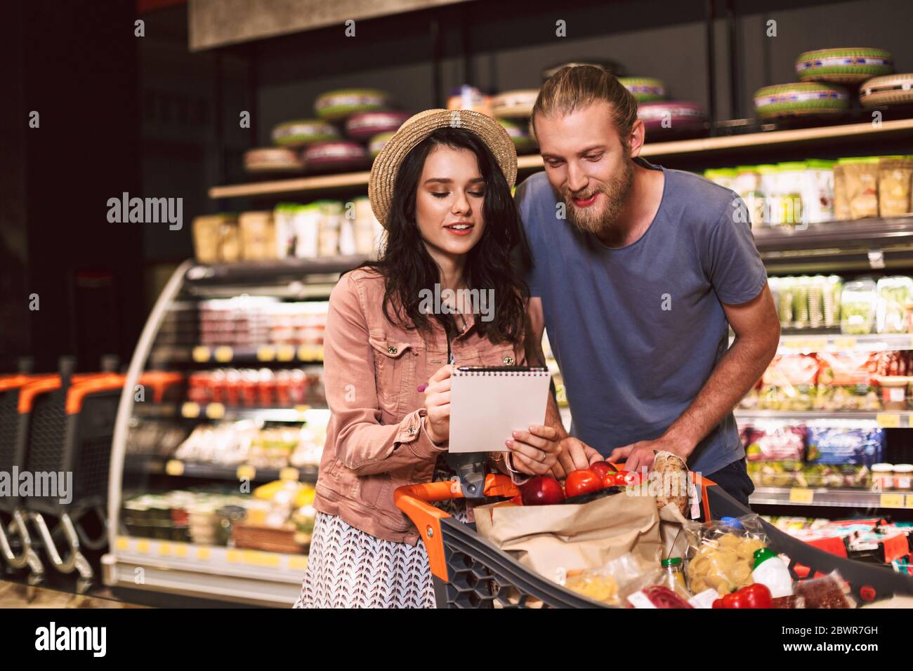 Variety reading grocery list reading shopping list hi-res stock ...