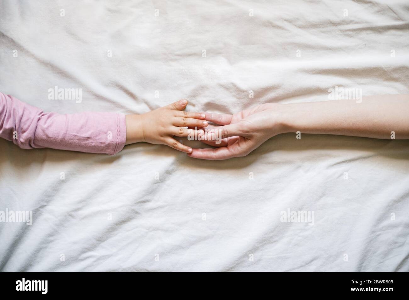 Hand reaching out child hi-res stock photography and images - Alamy