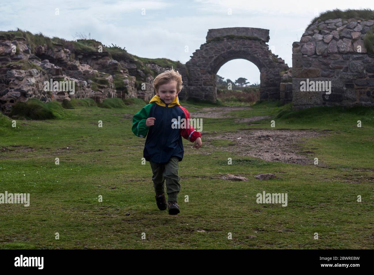 Little boy, 3 years old, running fast towards the camera, Botallack ...