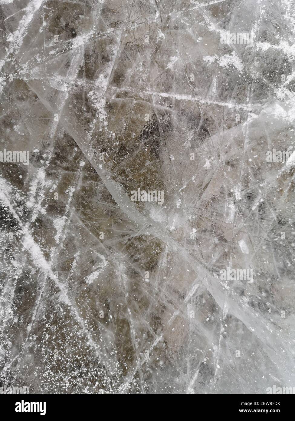 Photo of ice with scratches from the skates Stock Photo - Alamy