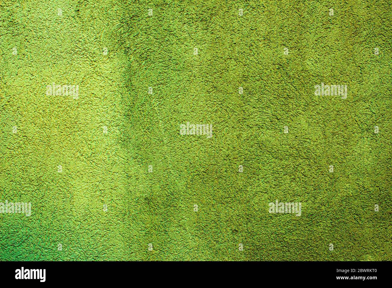 Yellow colored abstract wall background with textures of different ...