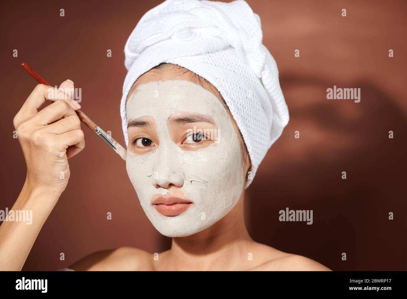 Applying hair mask hi-res stock photography and images - Alamy