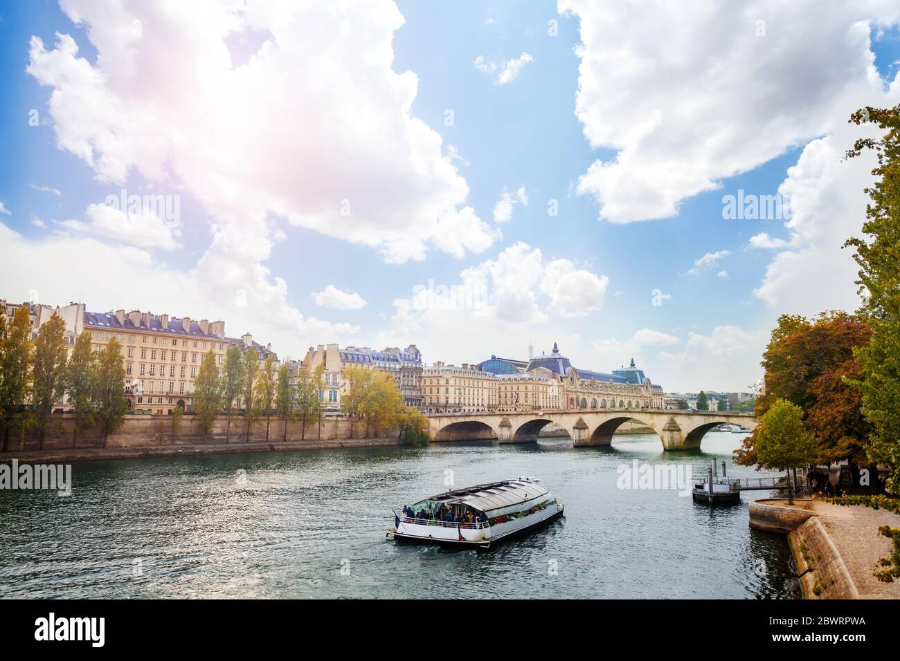 Pont Marie bridge in Paris downtown and boat on Seine river Stock Photo ...