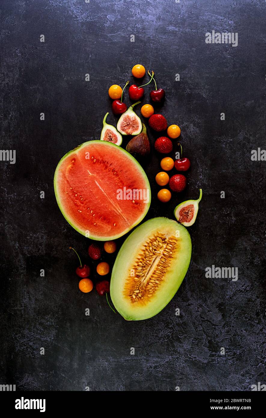 Vertical composition of berries and fruits Stock Photo - Alamy