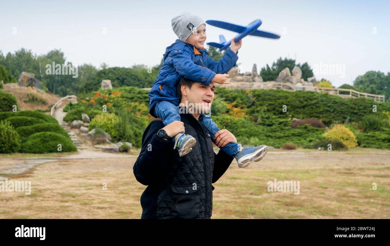 Boy launching airplane hi-res stock photography and images - Alamy