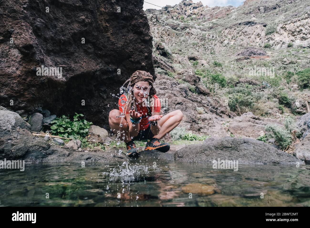 Drinking water stream person hi-res stock photography and images - Alamy