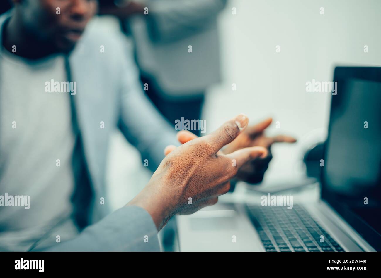 close up. employees looking at the laptop screen Stock Photo - Alamy