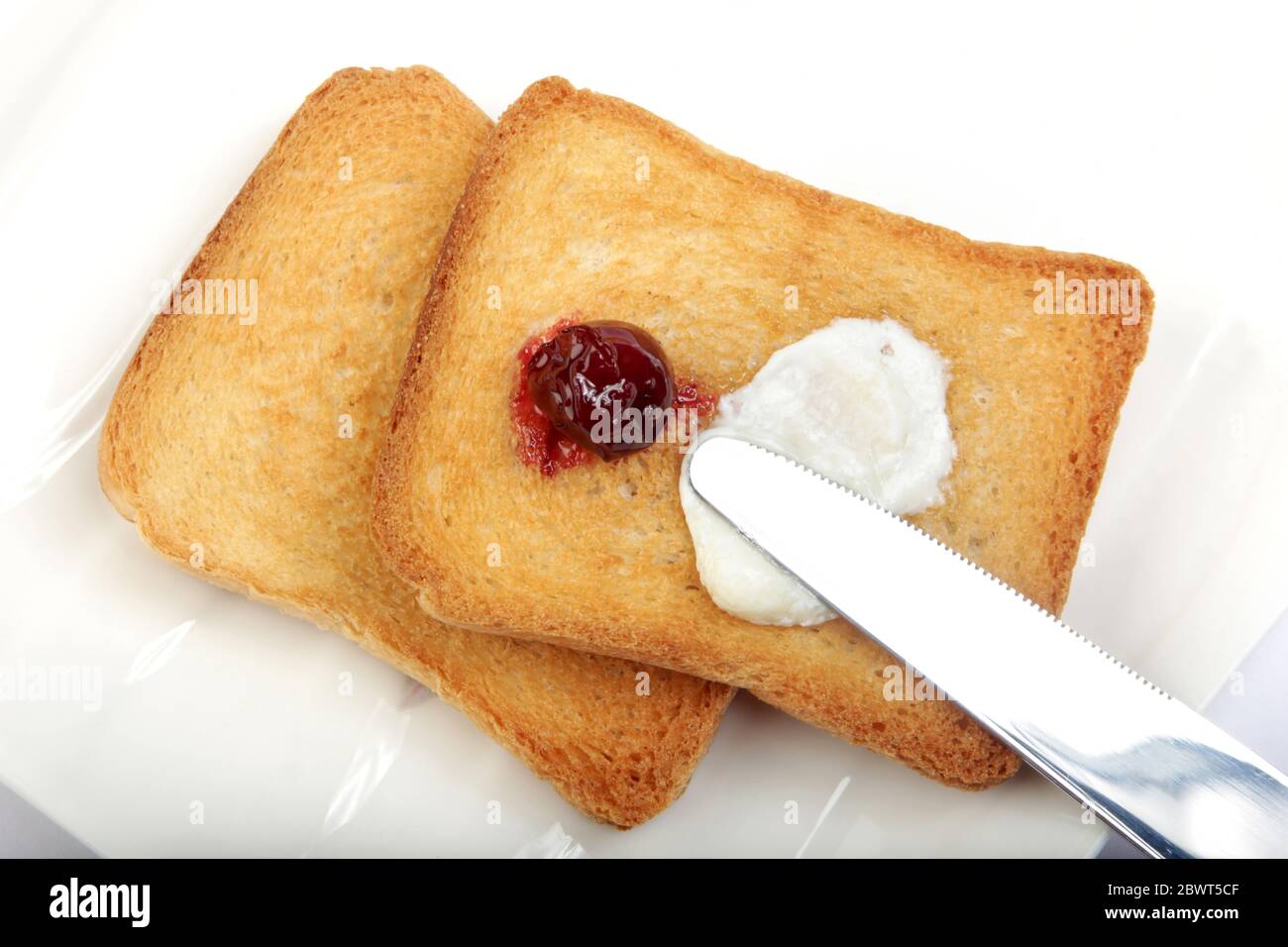 butter and jam on toasted bread Stock Photo - Alamy