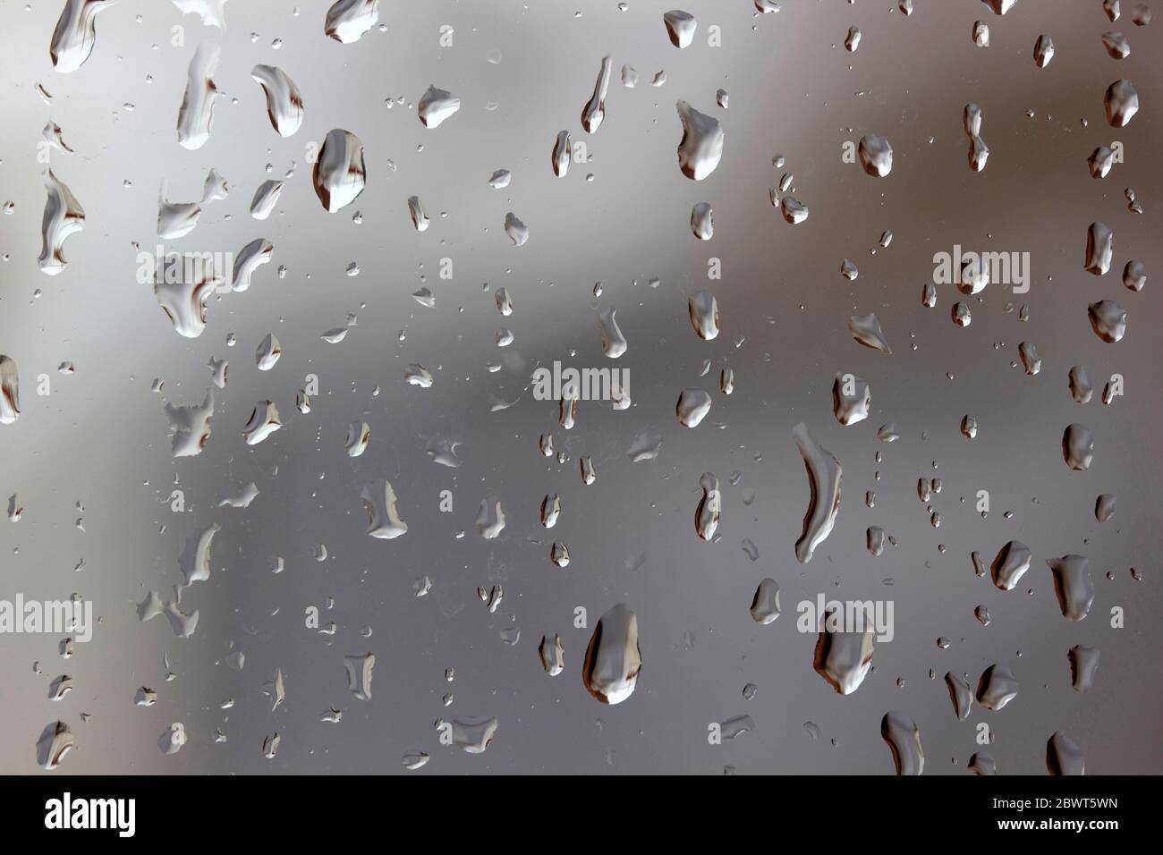 raindrops on glass texture abstract background Stock Photo - Alamy