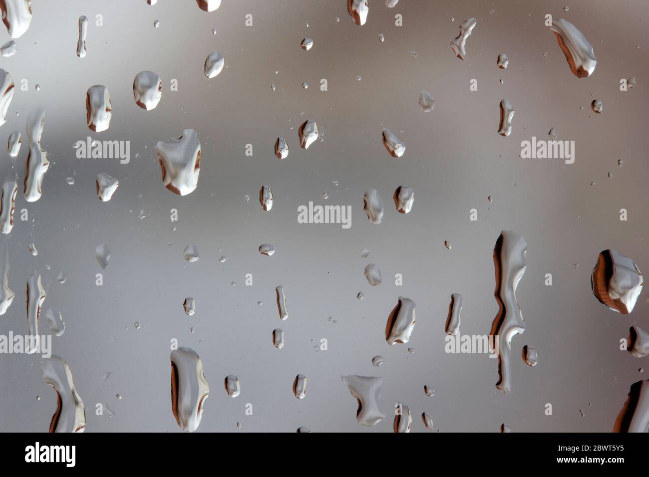raindrops on glass texture abstract background Stock Photo - Alamy
