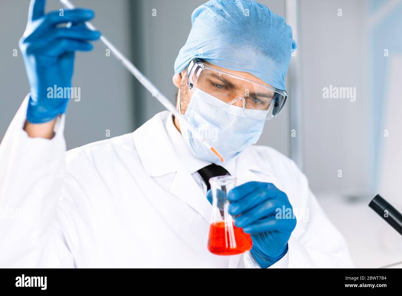 close up. scientist testing blood in the lab Stock Photo - Alamy