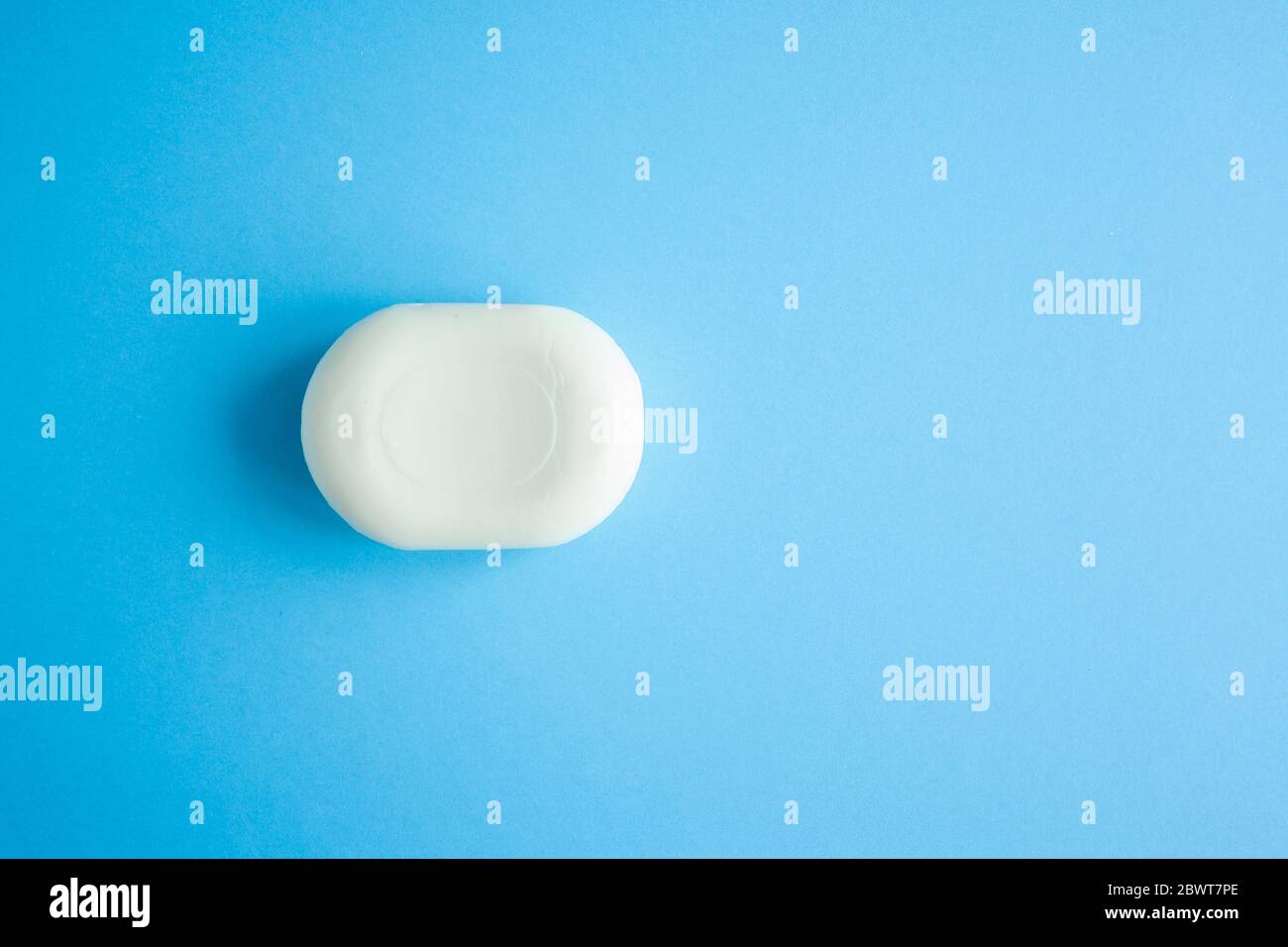 Soap top view on a blue background with trendy Stock Photo - Alamy
