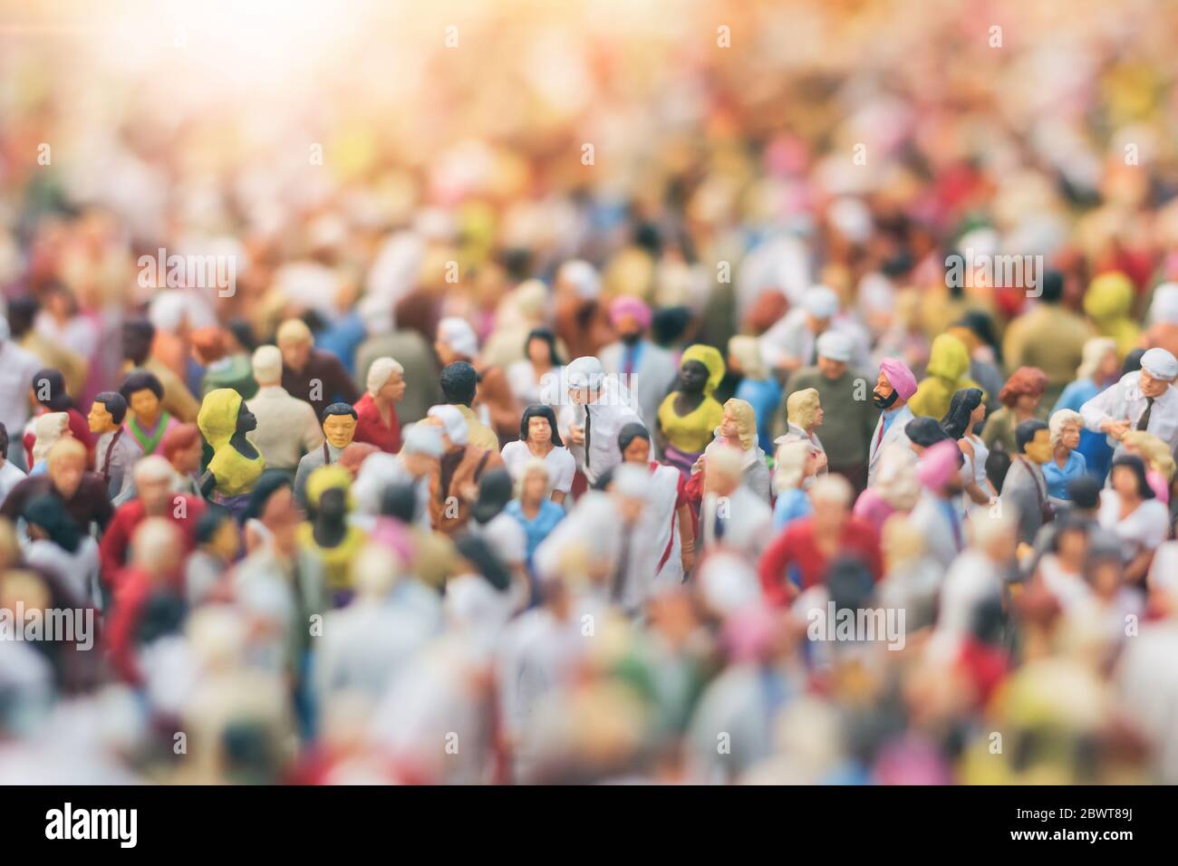 Colorful miniature crowd in the Sun. Multiracial gathering of people ...
