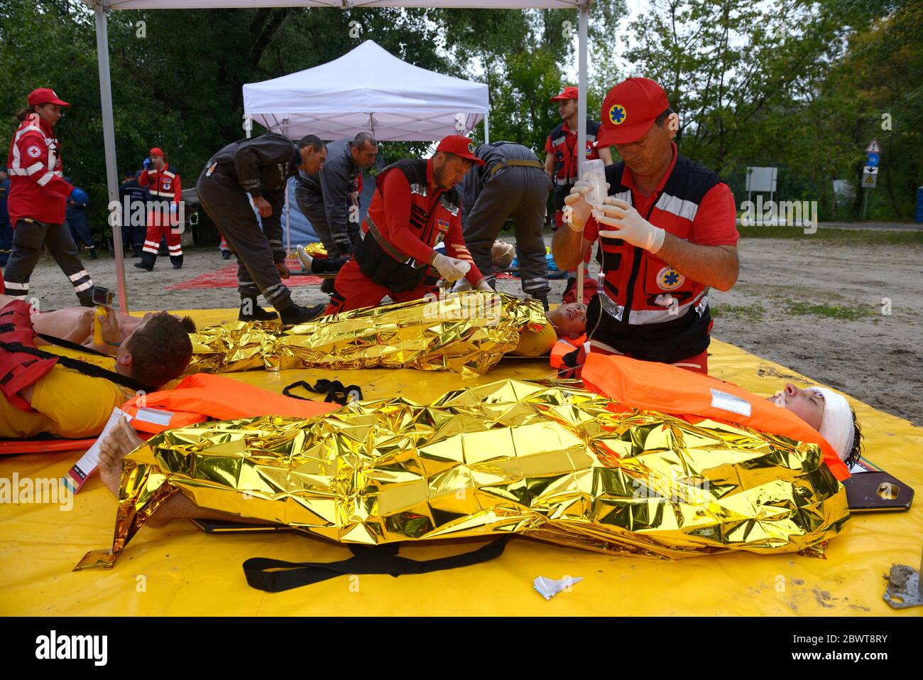 Paramedics giving first aid to sufferers at the first aid post. October ...