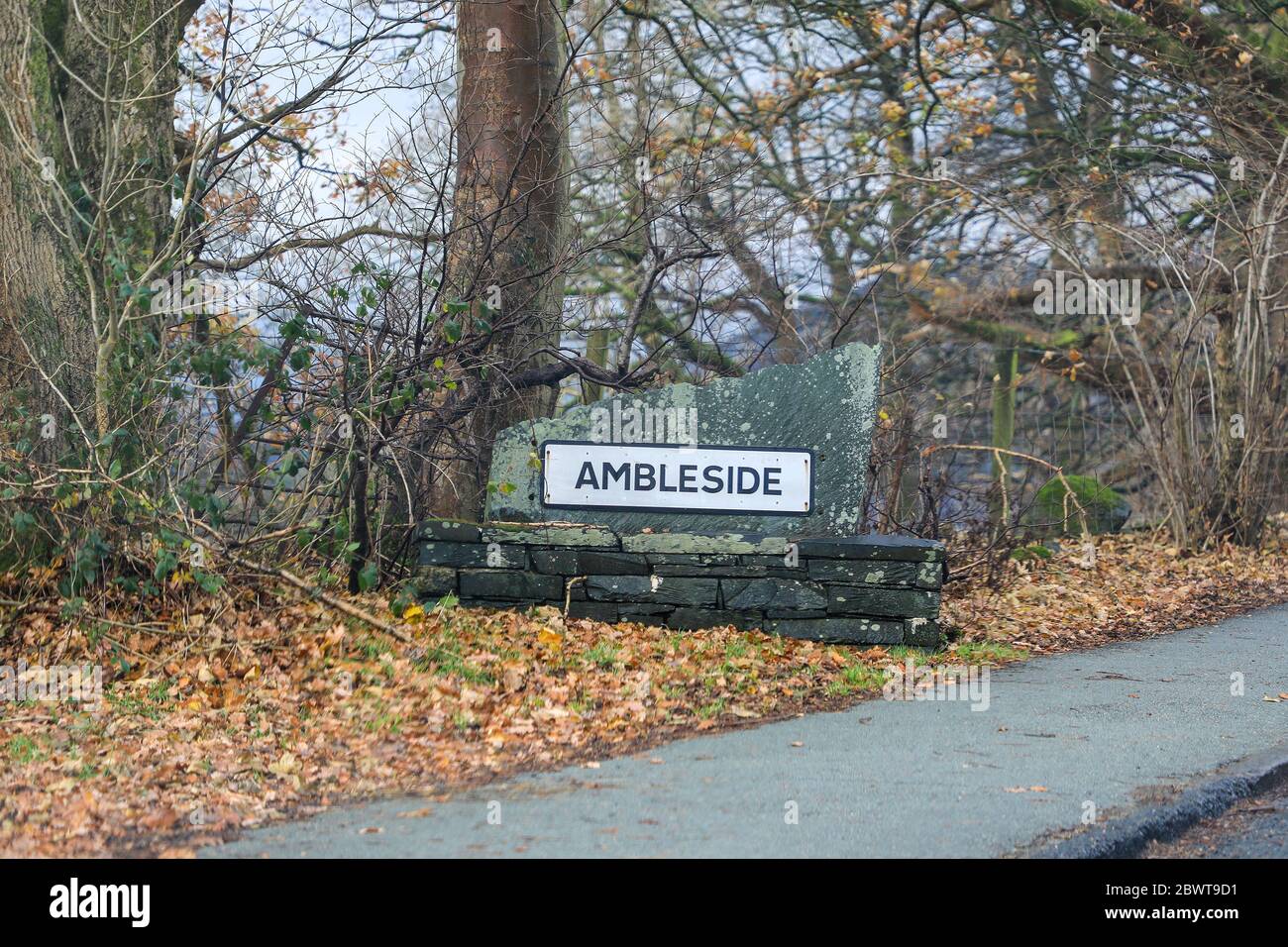 A sign at the side of the road saying 'Ambleside', in the English Lake ...