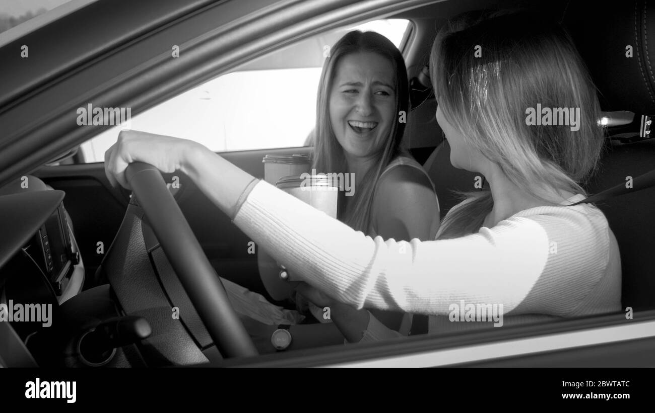 Black woman driving a car Black and White Stock Photos & Images - Alamy