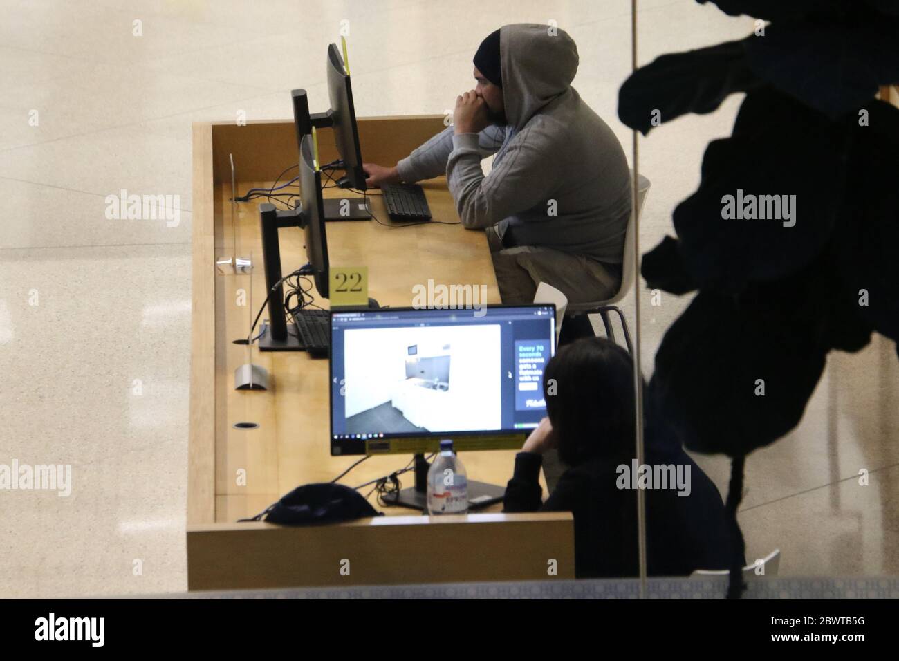 People use computers in the State Library of NSW in Sydney, Australia ...