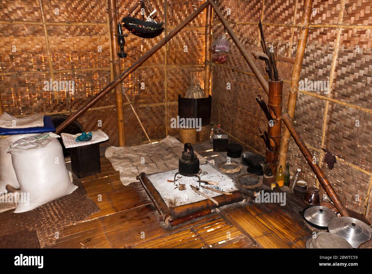 The interior of a typical Burmese bamboo shack in a poor village ...