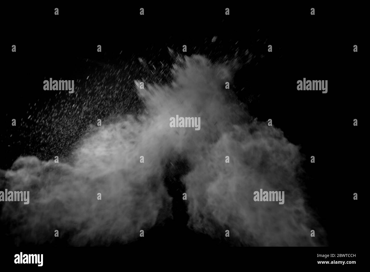 Abstract colored dust explosion on a black background.abstract powder ...