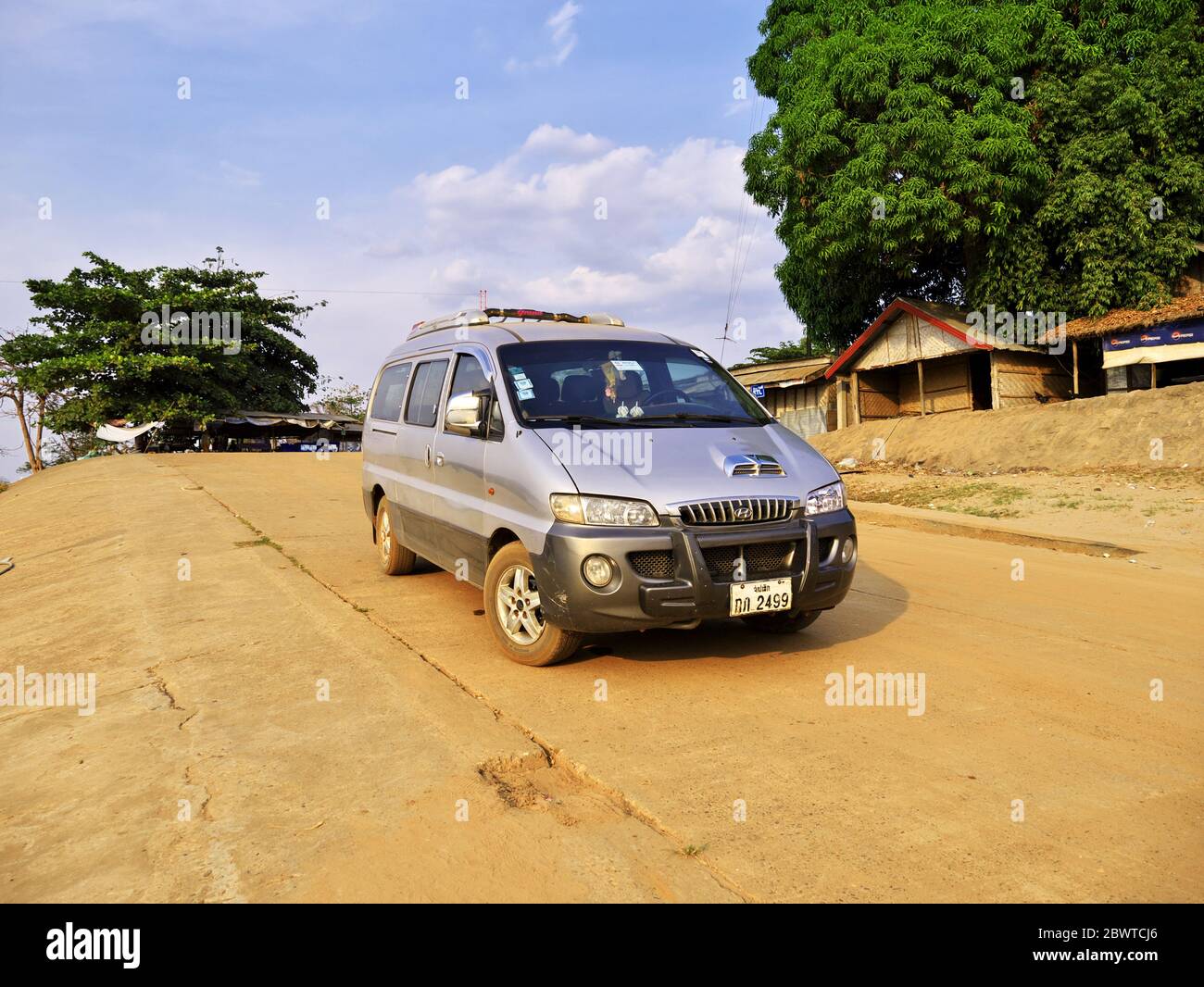 The bus on Mekong river, Champassak, Laos Stock Photo - Alamy