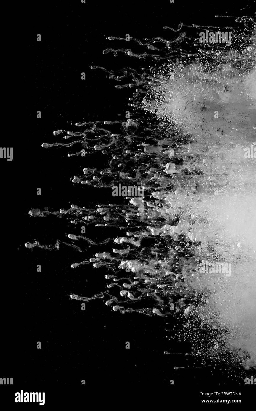 Abstract colored dust explosion Black and White Stock Photos & Images ...
