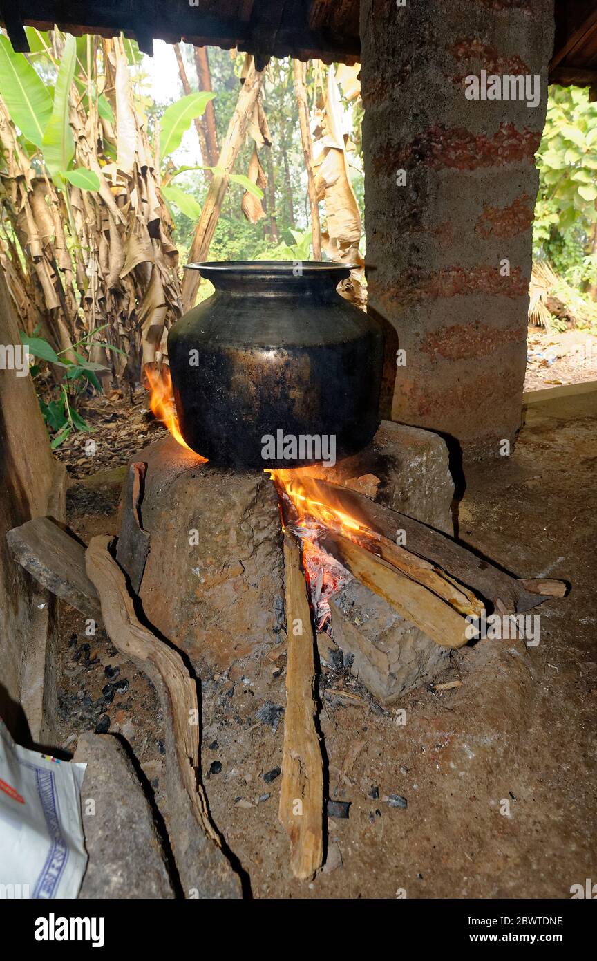 Boiling water on an open fire in rural Indian village Stock Photo - Alamy