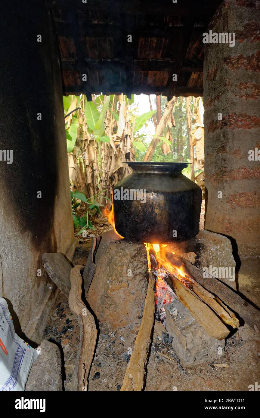 Boiling water on an open fire in rural Indian village Stock Photo - Alamy
