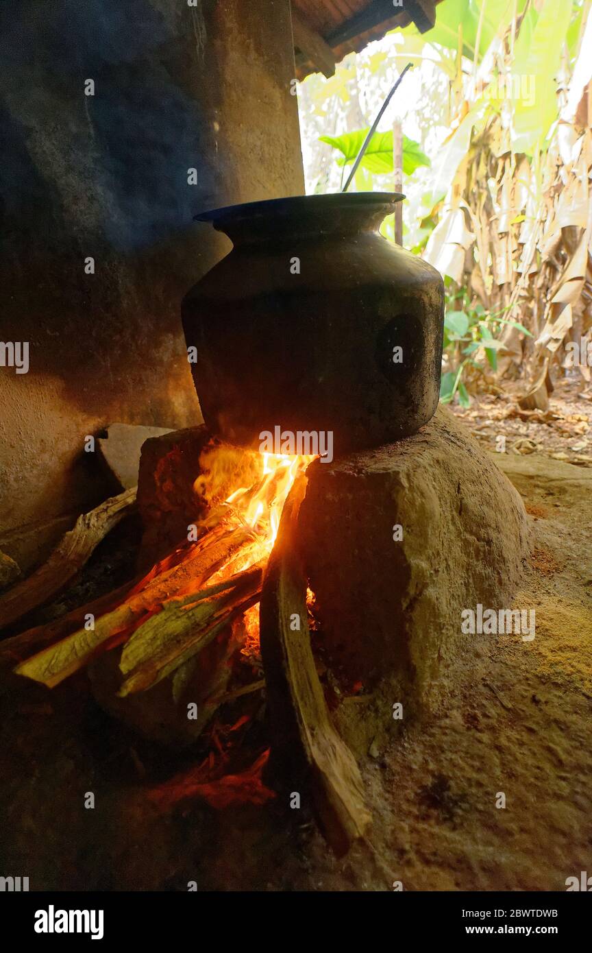 Boiling water on an open fire in rural Indian village Stock Photo - Alamy