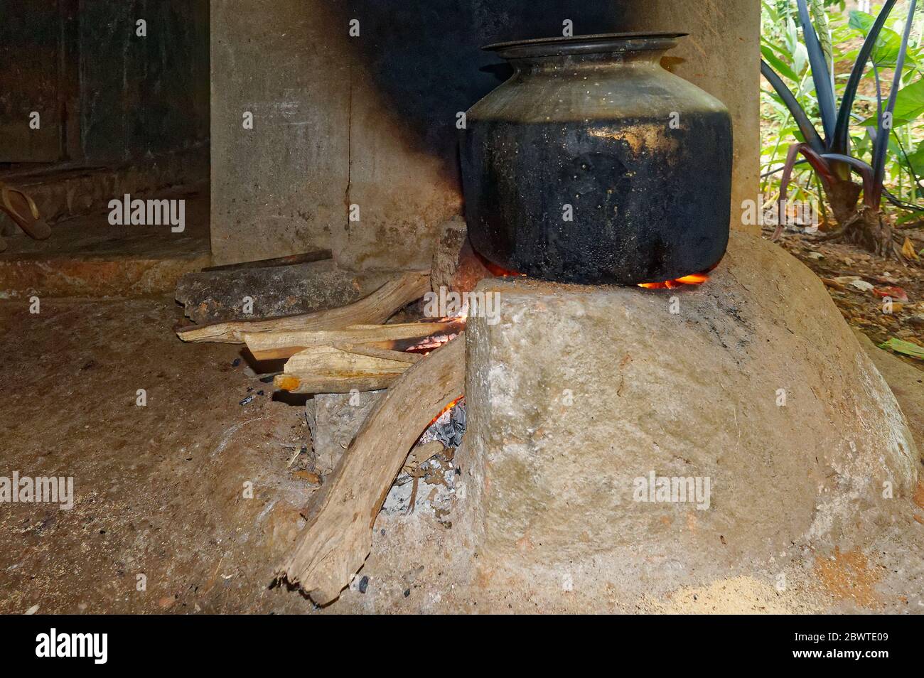 Boiling water on an open fire in rural Indian village Stock Photo - Alamy