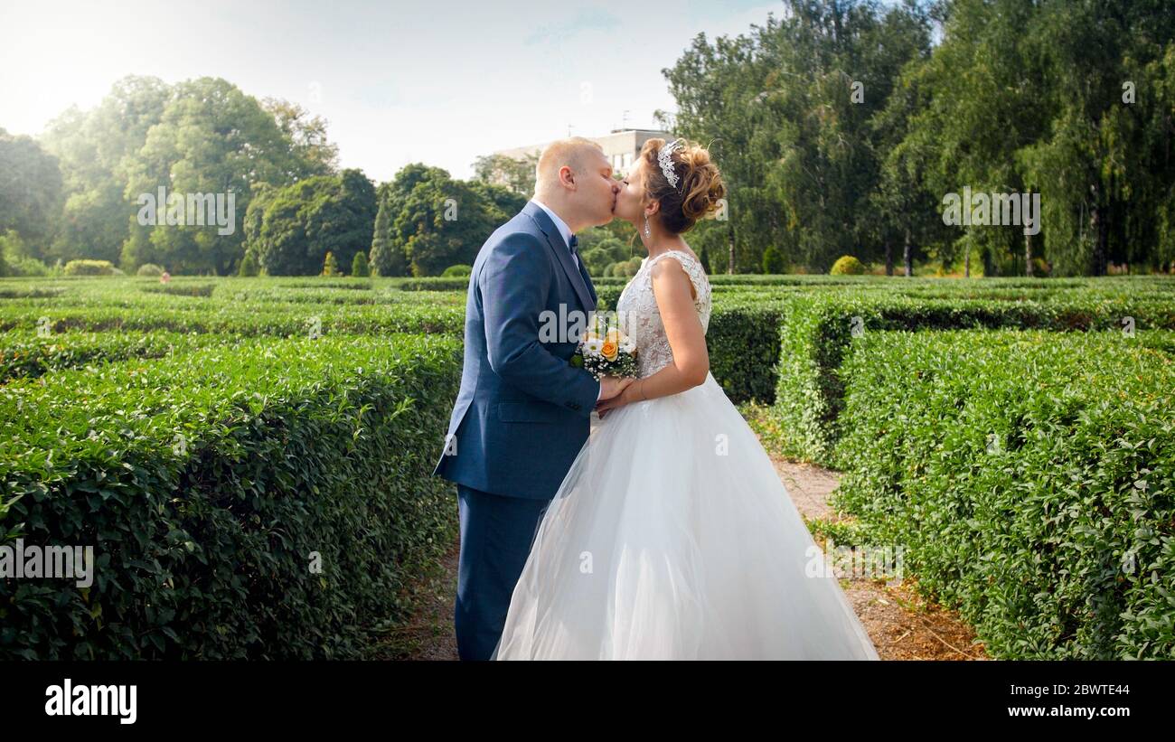 Newly married couple kissing in hi-res stock photography and images - Alamy