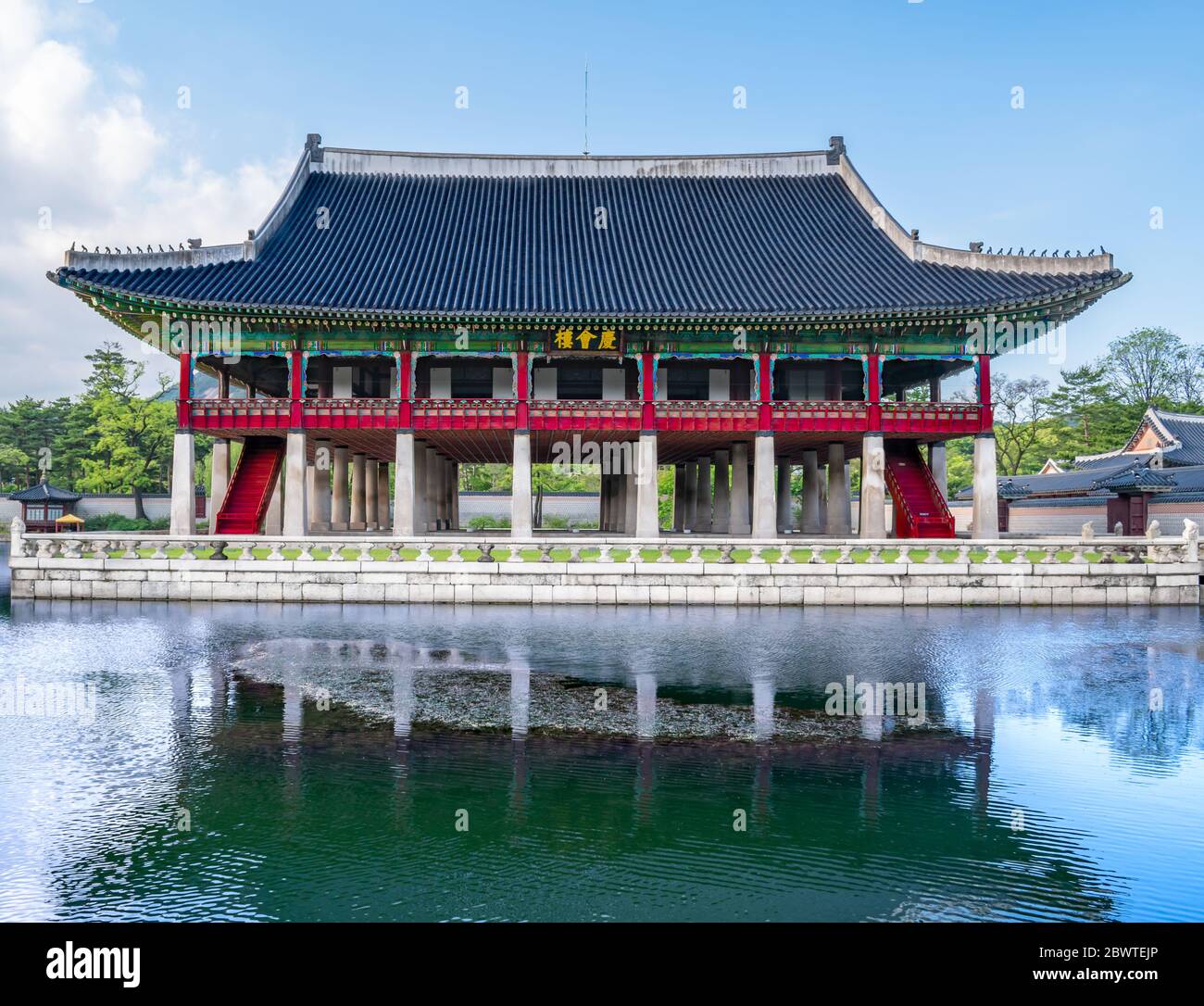 A beautiful portrait of Gyeonghoeru Pavilion located within the walls ...
