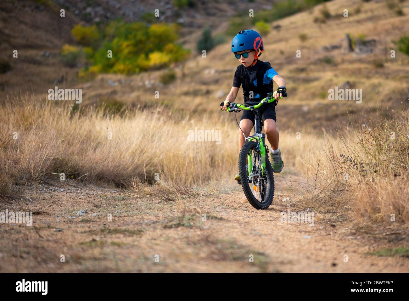 Kid and bicycle hi-res stock photography and images - Alamy
