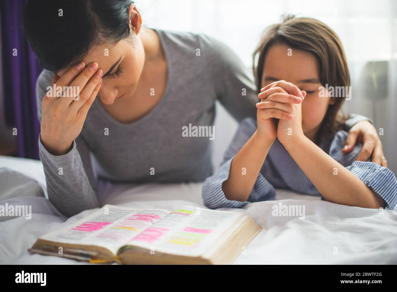 Family Praying Bed High Resolution Stock Photography and Images - Alamy