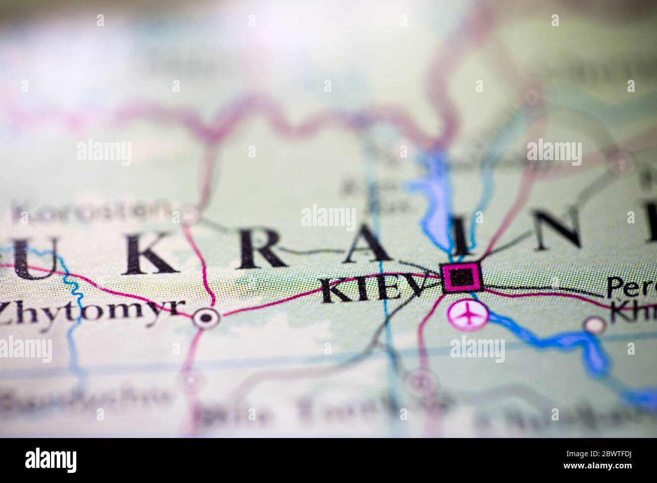 Shallow depth of field focus on geographical map location of Kiev city ...