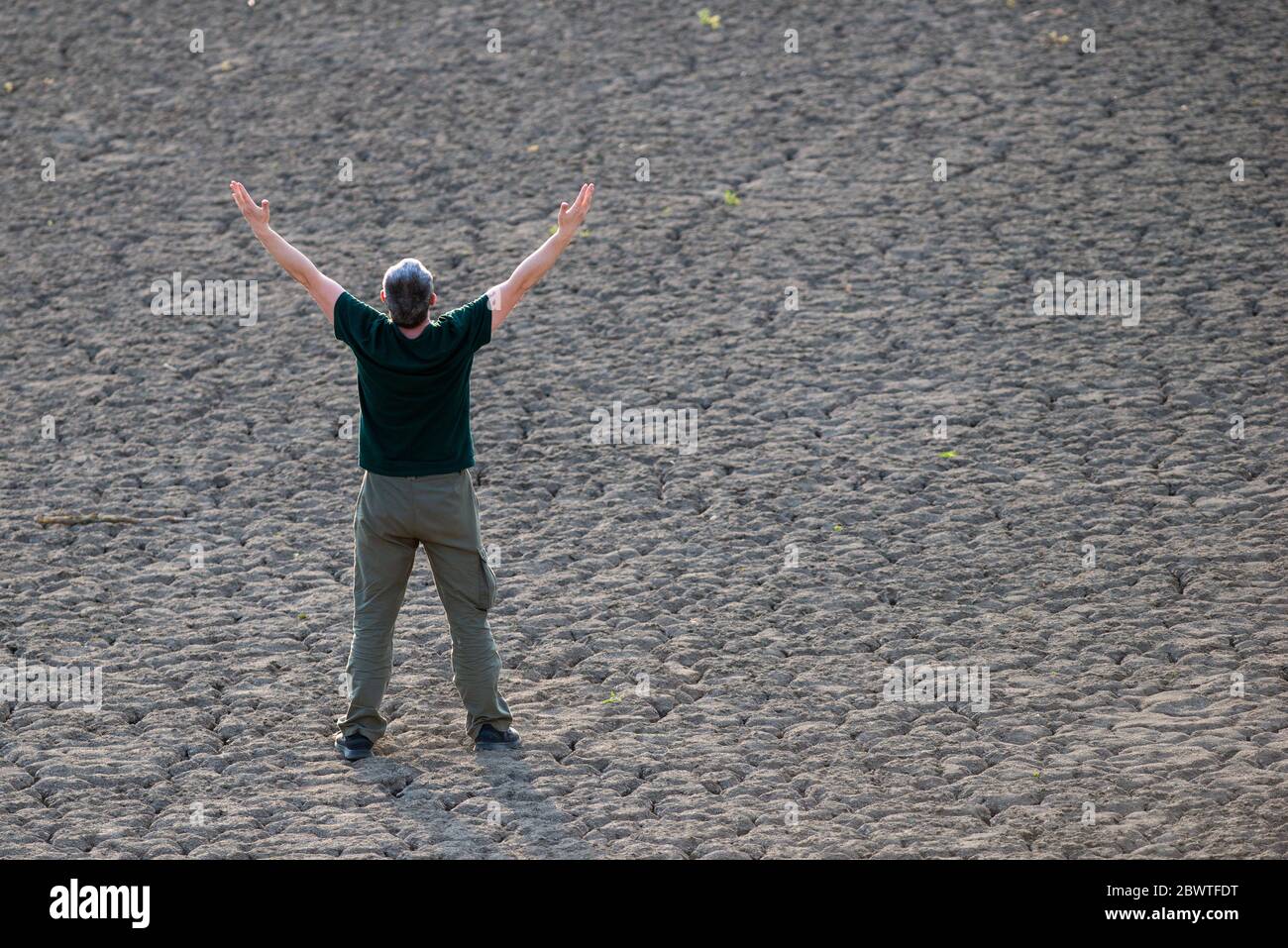 Praying in the rain hi-res stock photography and images - Alamy