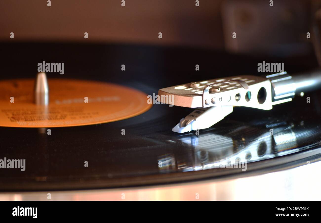 The magic of a spinning disc and music spreading Stock Photo - Alamy