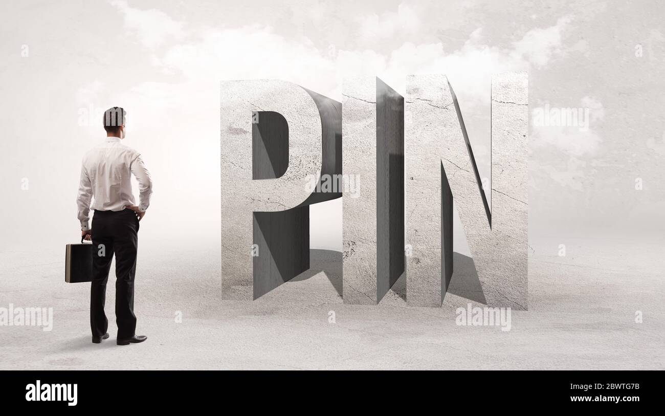 Rear view of a businessman standing in front of PIN abbreviation ...