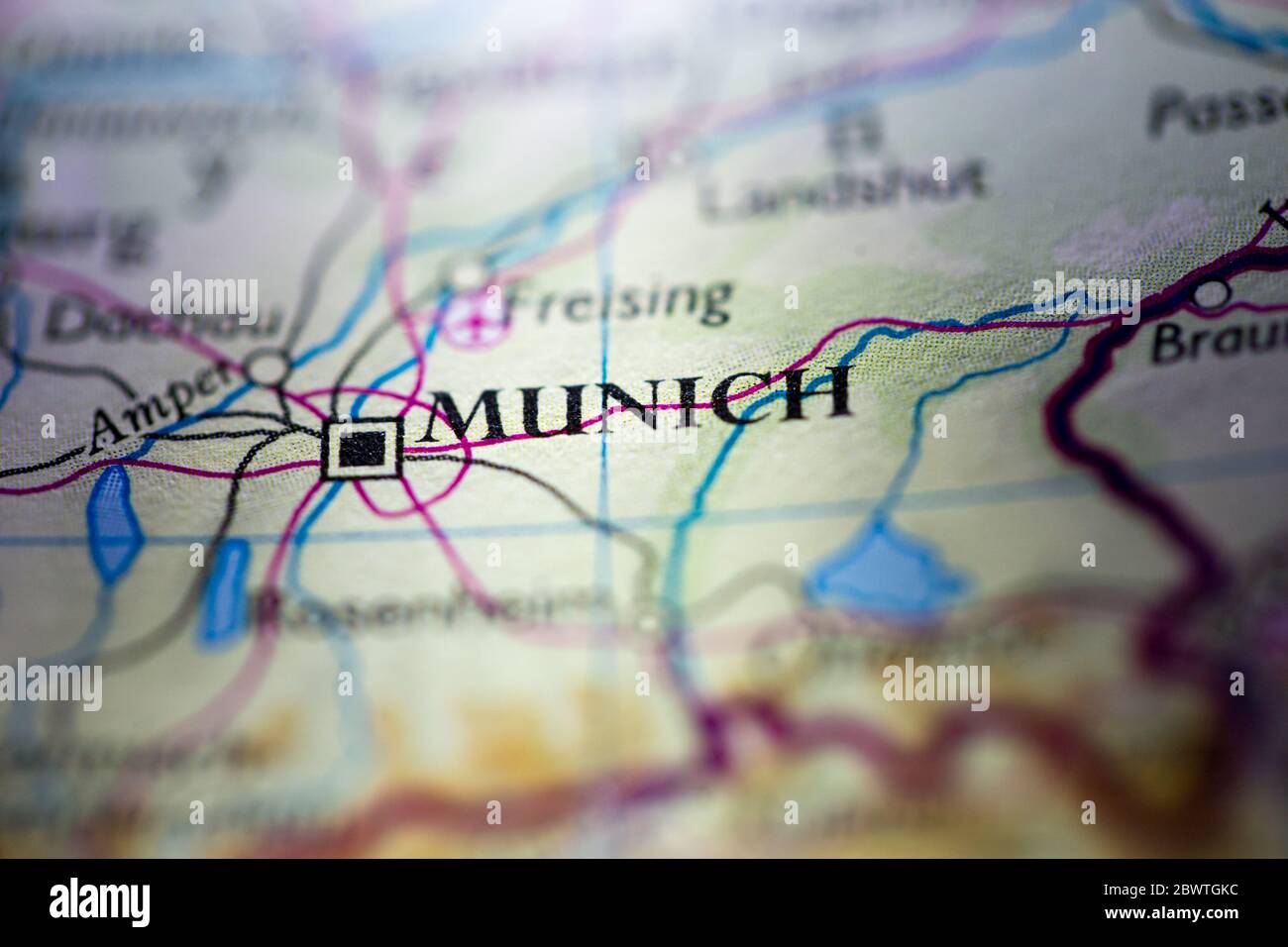 Shallow depth of field focus on geographical map location of Munich ...