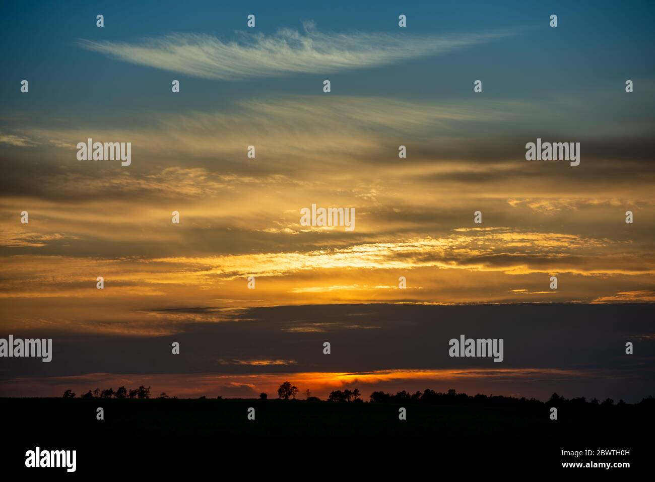 Early June Sunset During a Cloudy Evening Over Hampshire, England Stock ...