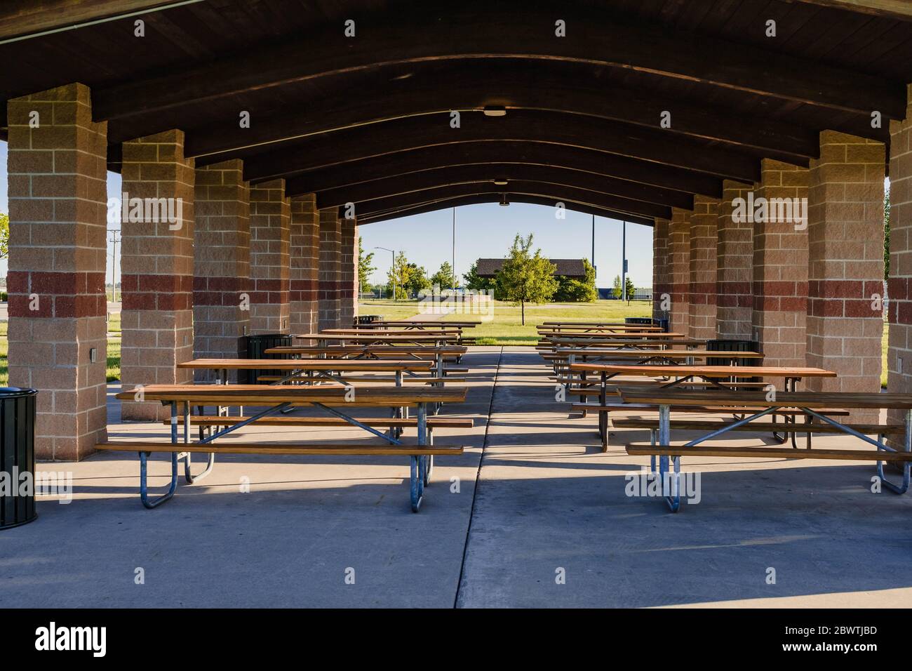 a picnic tables in a pavilion are common gathering places during a ...