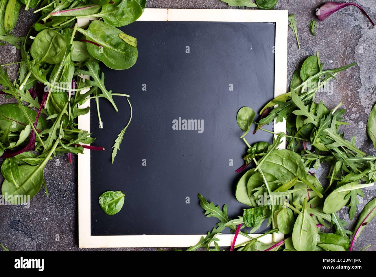 Mixed salad leaves with chalk board, Background, texture Stock Photo ...