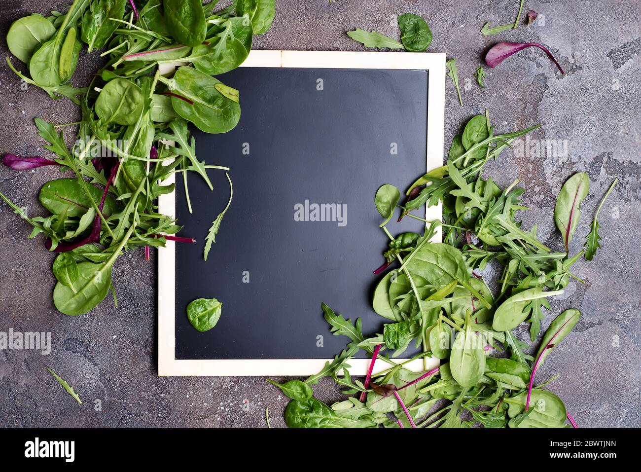 Mixed salad leaves with chalk board, Background, texture Stock Photo ...
