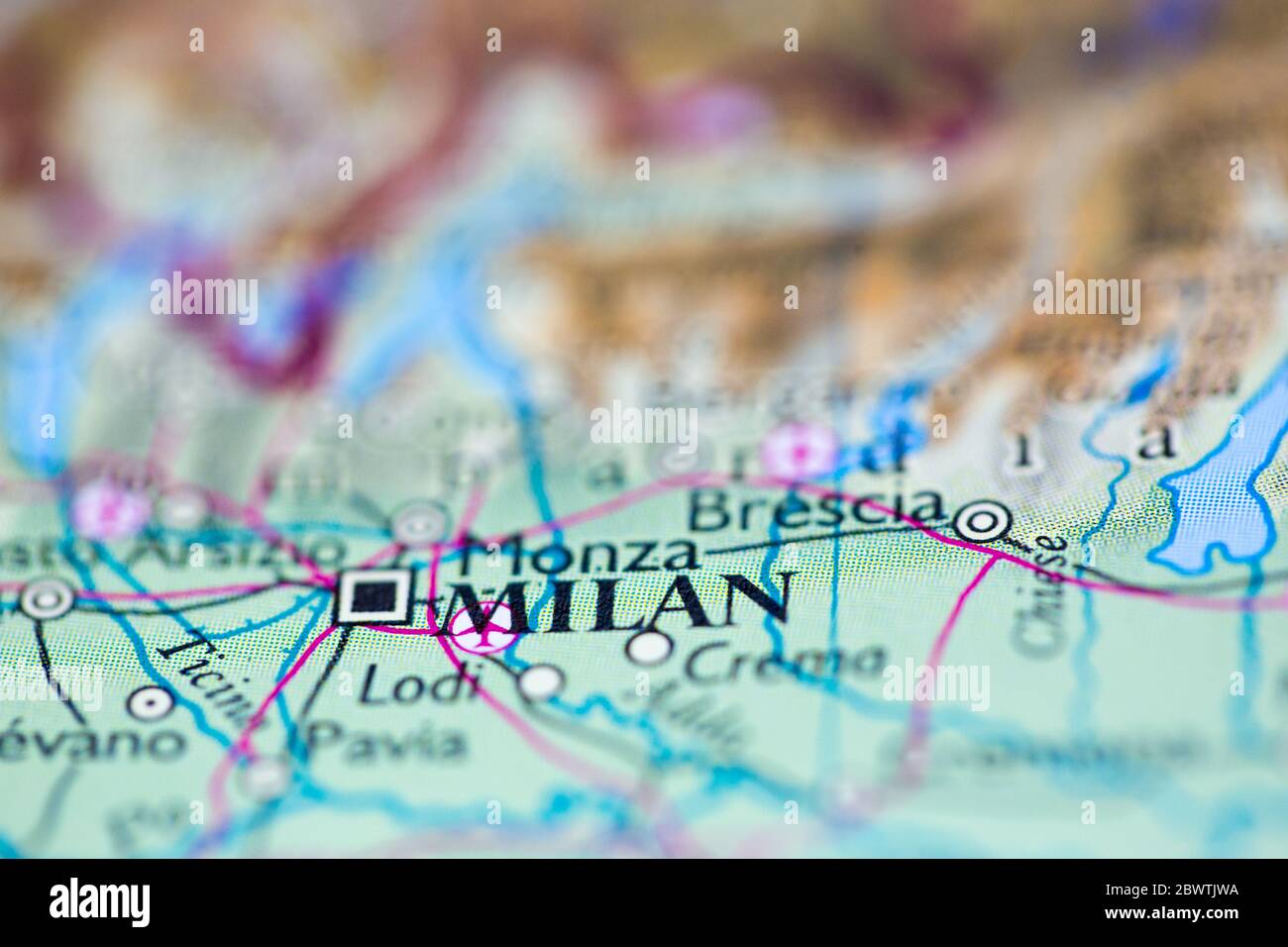 Shallow depth of field focus on geographical map location of Milan city ...