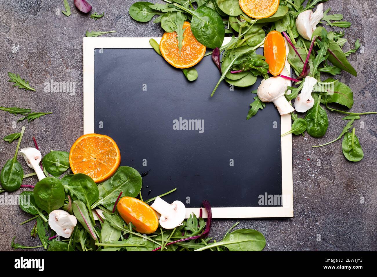 Mixed salad leaves with chalk board, Background, texture Stock Photo ...