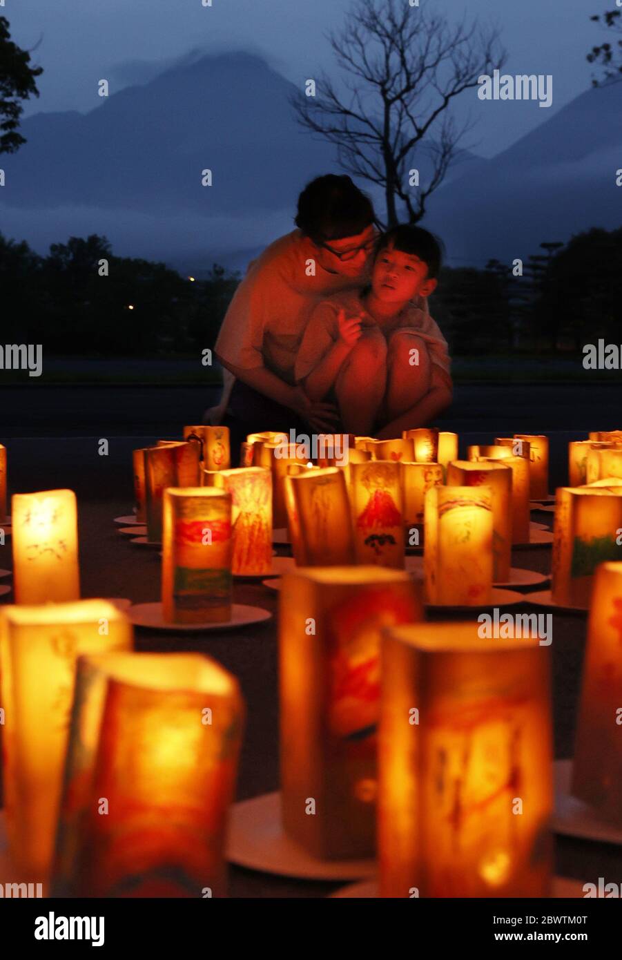 Candles are lit in Shimabara, southwestern Japan, on June 3, 2020, as ...