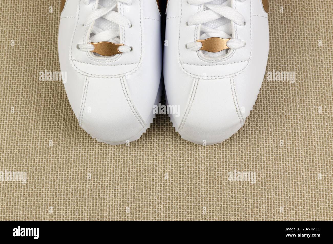 Front part of white sport shoes, shot from above Stock Photo - Alamy